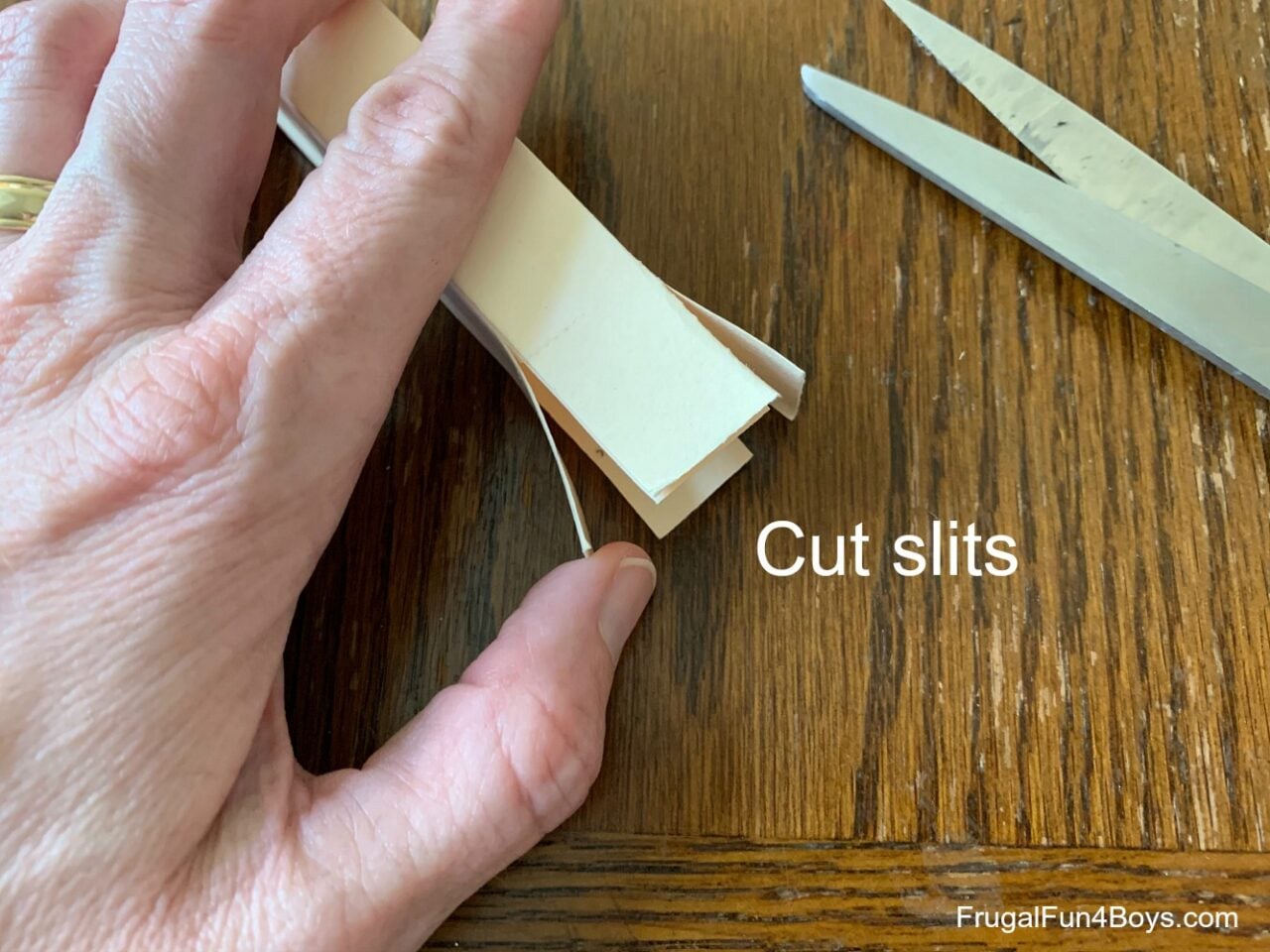 Make a Paper Tumbling Toy - Frugal Fun For Boys and Girls