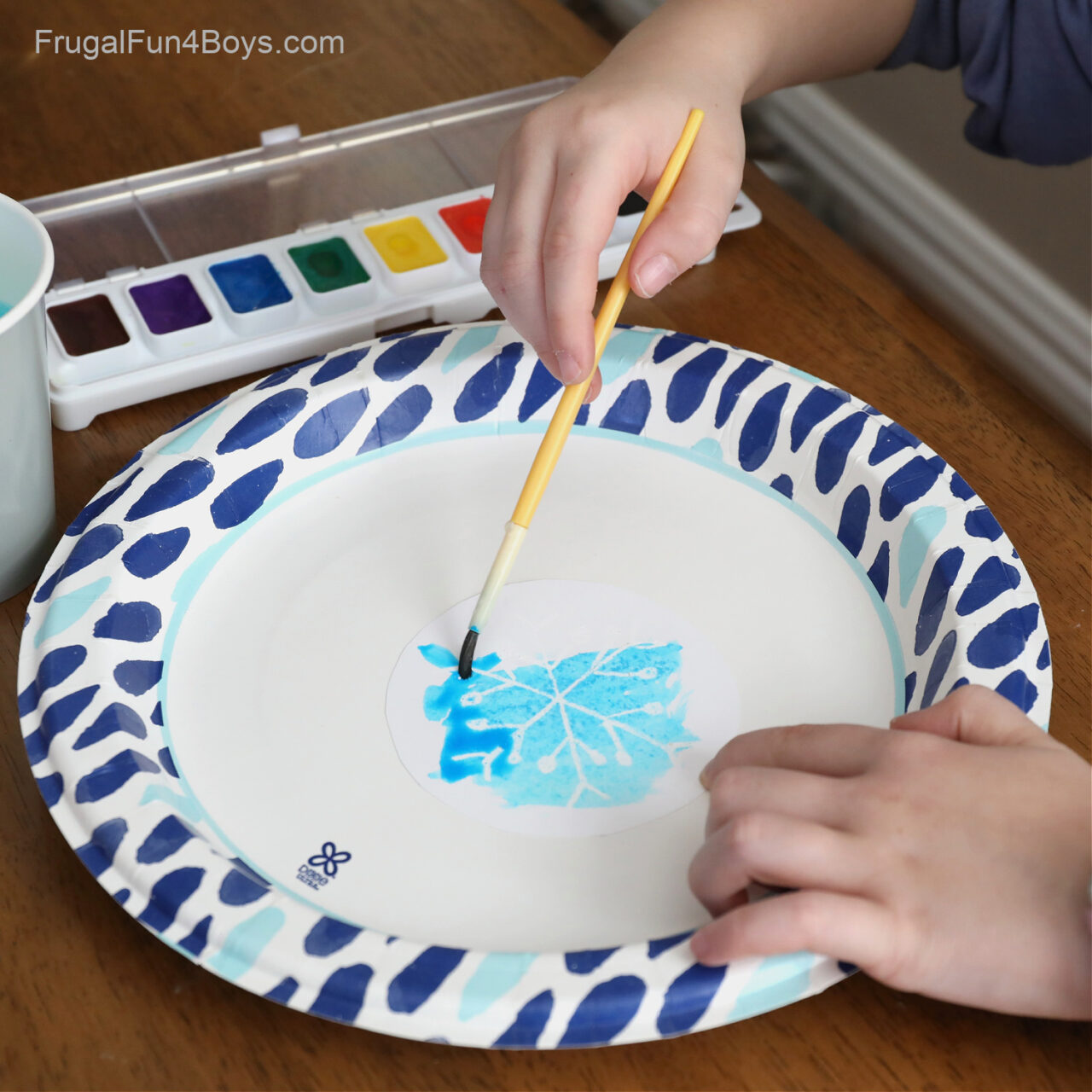 Watercolor and White Crayon Snowflakes - Frugal Fun For Boys and Girls